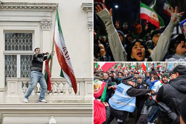 Protester scales Iranian Embassy in London, tears down regime flag ...
