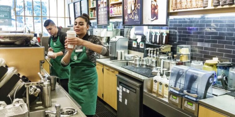 Starbucks is offering $1,200 bonuses, expanded tipping, and weekly ...