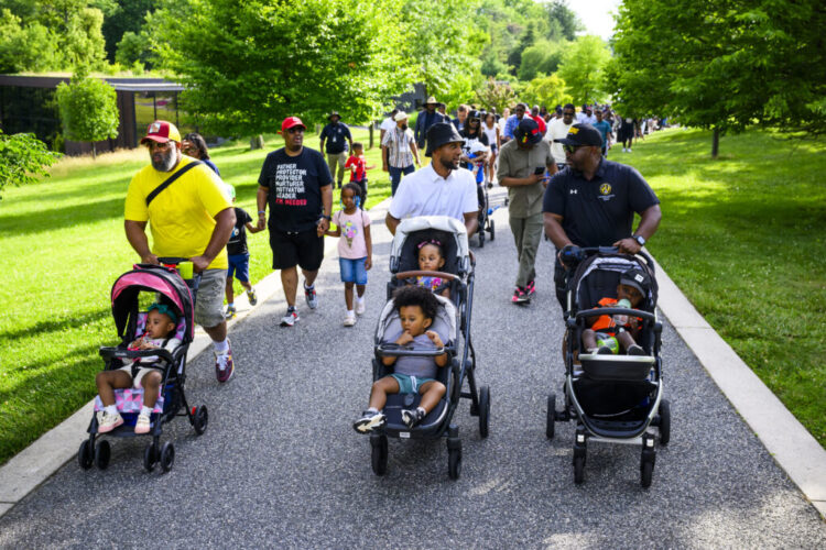 These stroller-pushing fathers came together for a walk. They left with ...